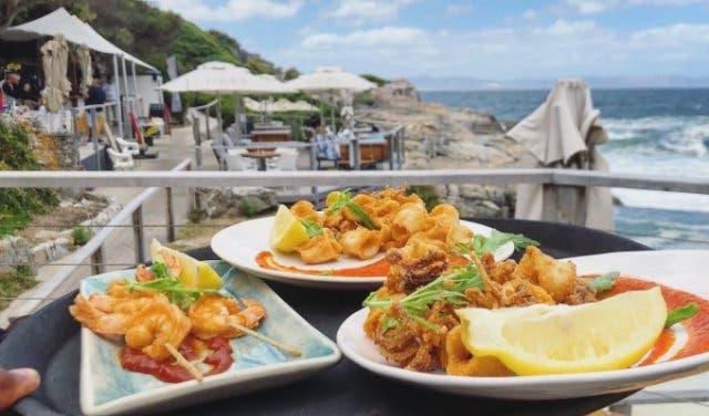 This now-famous eatery on the cliffs overlooking a bright-blue ocean